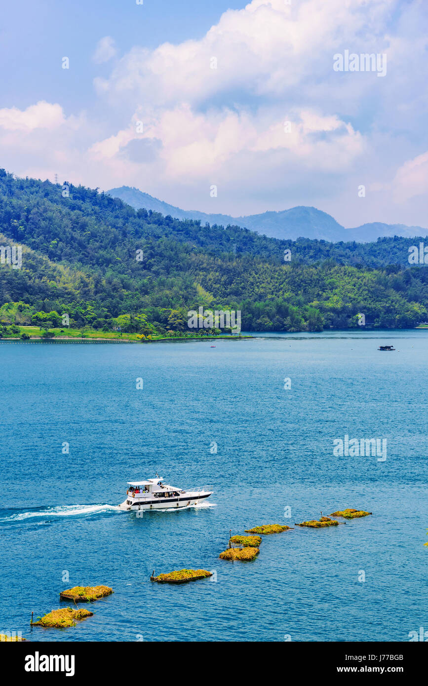 View of Sun Moon Lake nature and boat in Taiwan Stock Photo - Alamy