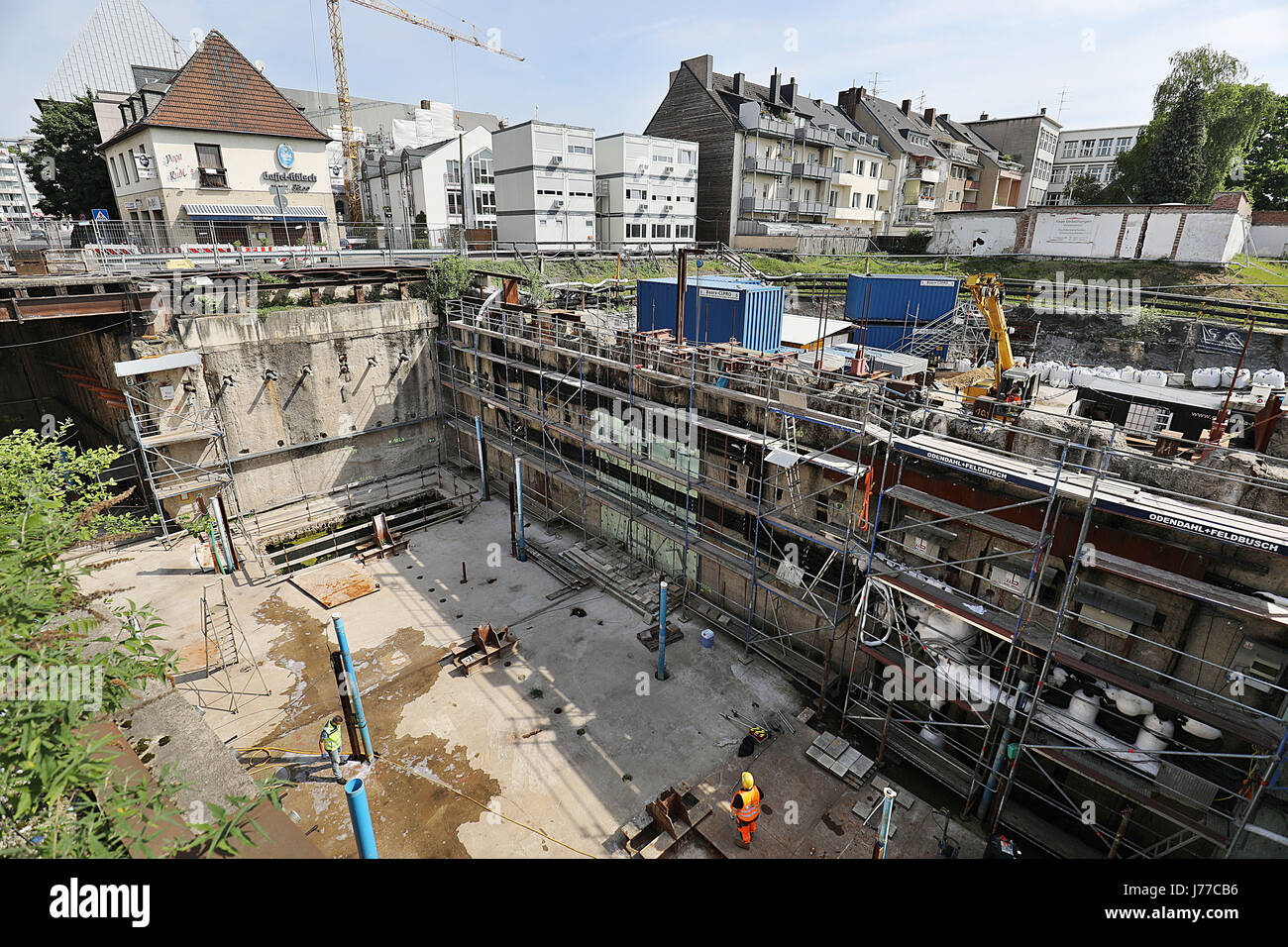Workers seen at the location where the city archive collapsed in ...