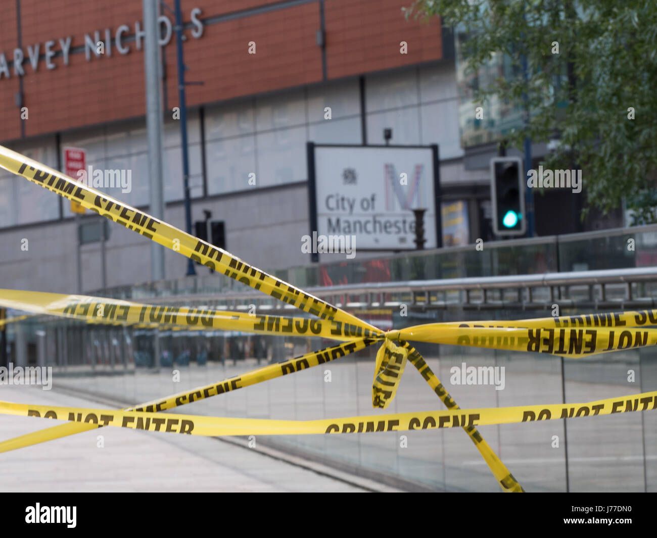 Manchester, UK. 23rd May, 2017. The police crime scene tape used as a ...