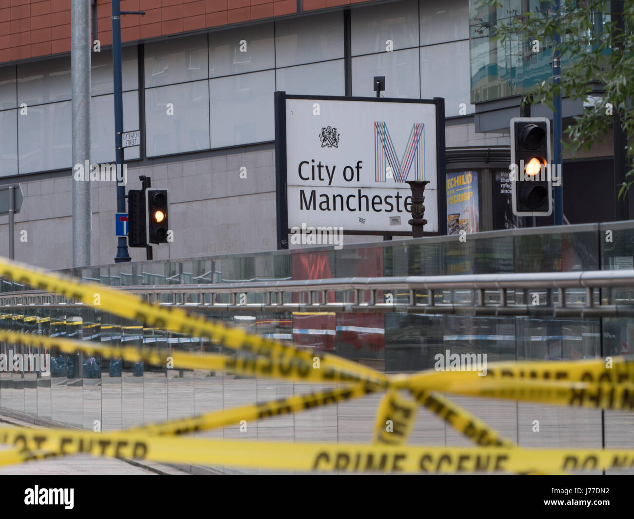 Manchester, UK. 23rd May, 2017. The police crime scene tape used as a ...
