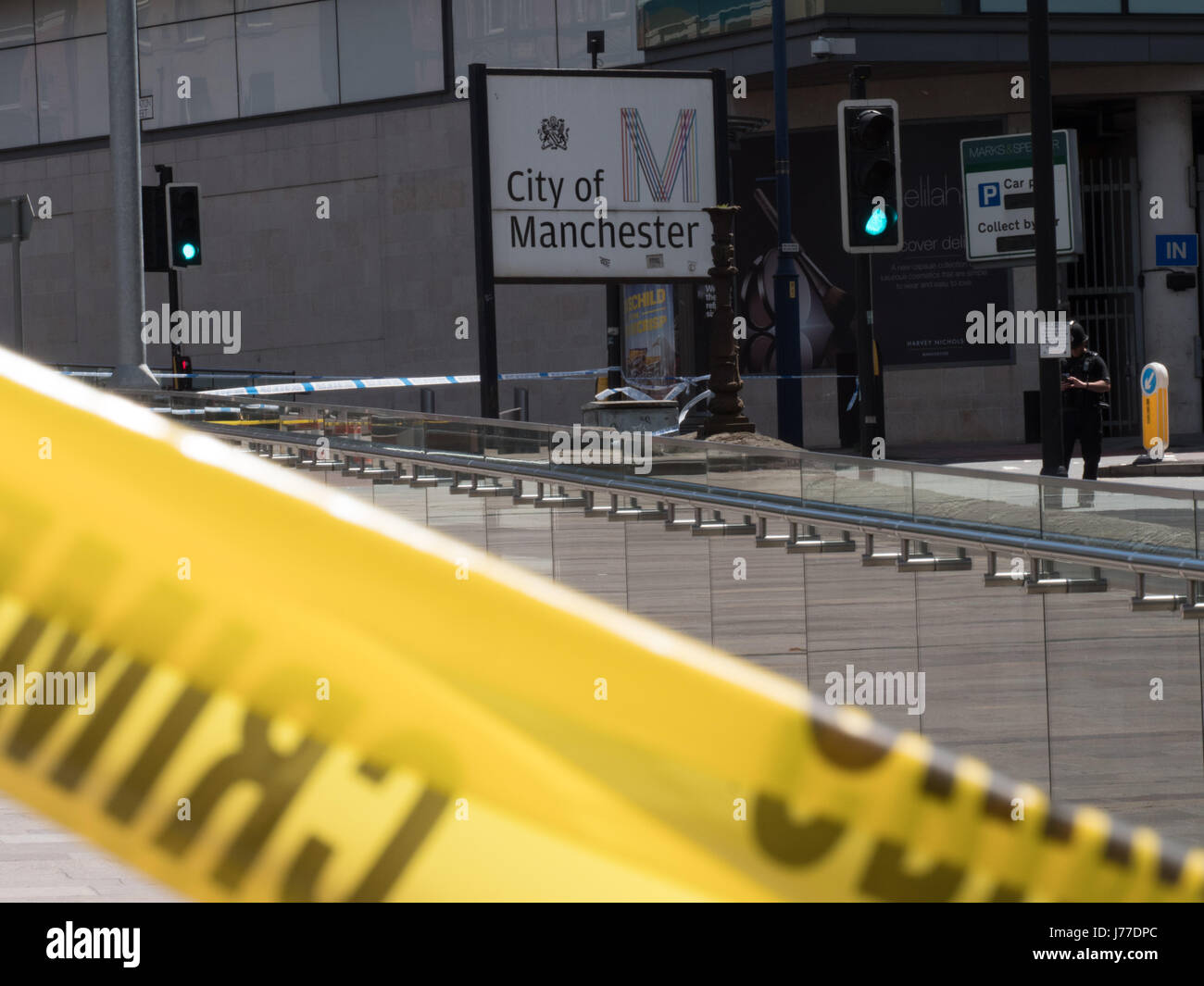 Manchester, UK. 23rd May, 2017. The police crime scene tape used as a ...