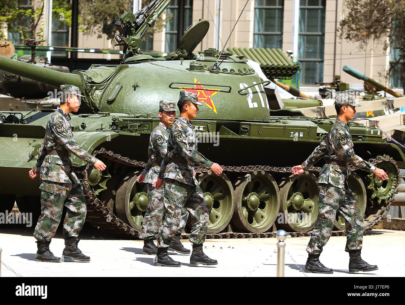 April 29, 2017 - Beijing, CHINA - Chinese soldiers march by a tank on ...