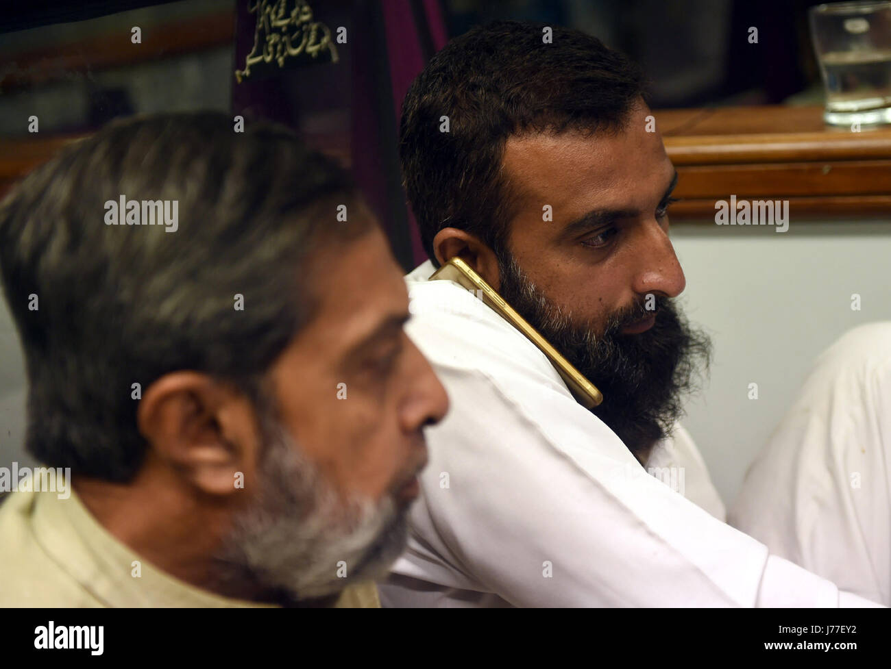 Traders are busy in dealing during trading times at Pakistan Stock ...