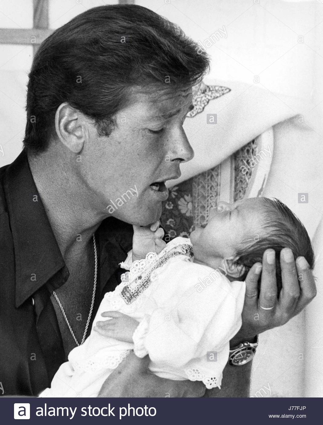 Roger Moore Black and White Stock Photos & Images - Alamy