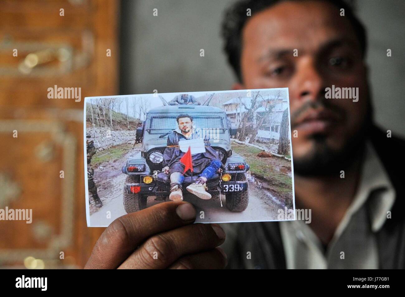 BUDGAM, INDIA - MAY 23: Embroidery artisan Farooq Ahmad Dar who was ...