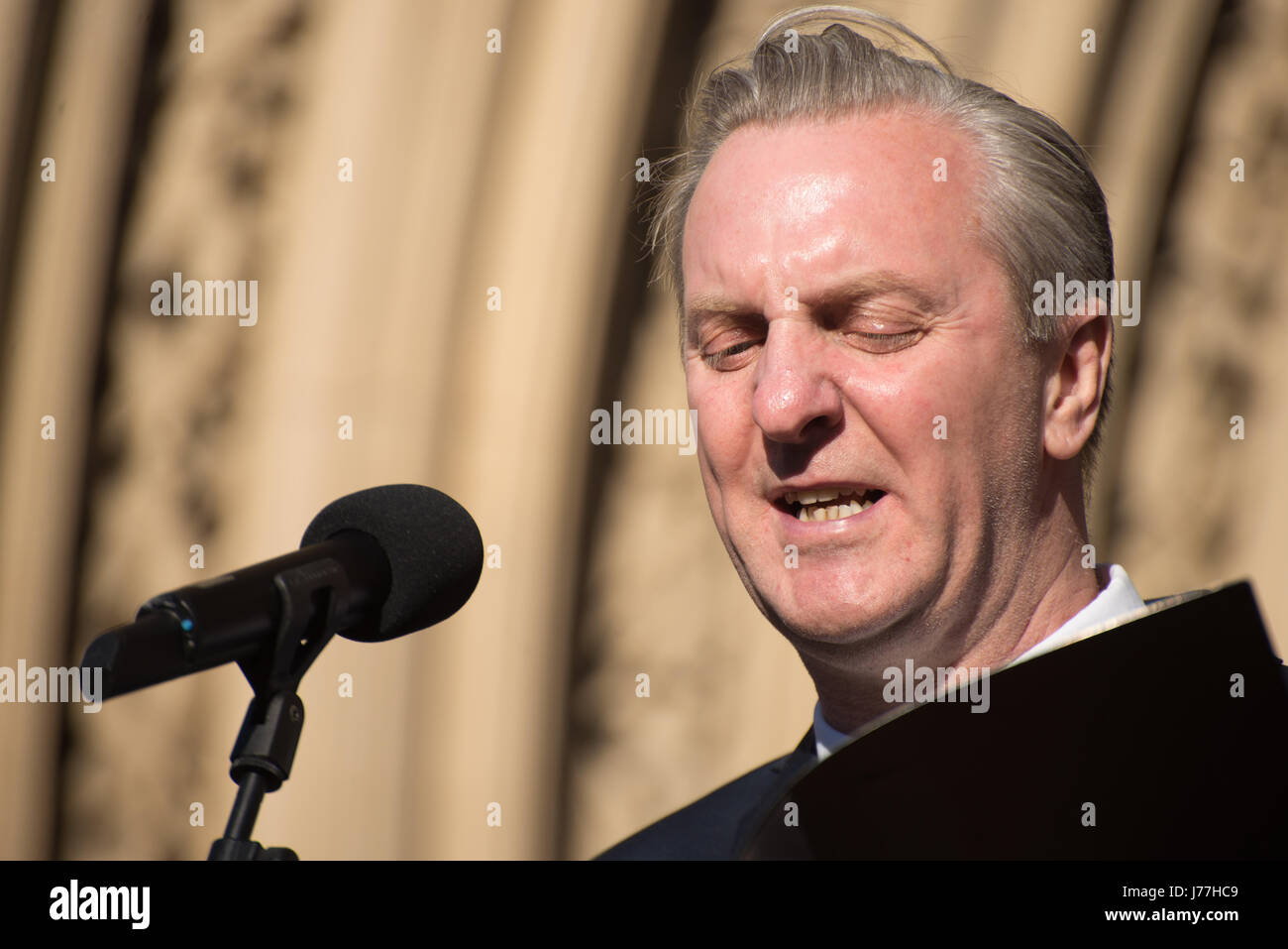 Manchester, UK. 23rd May, 2017. Tony Walsh, poet, recites a poem called ...
