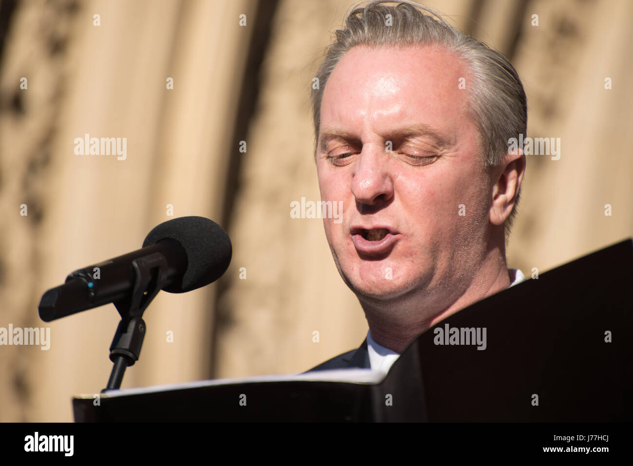 Manchester, UK. 23rd May, 2017. Tony Walsh, poet, recites a poem called ...