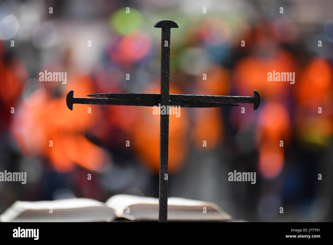A cross made of nails and an open Bible in front of the Kaiser Wilhelm ...