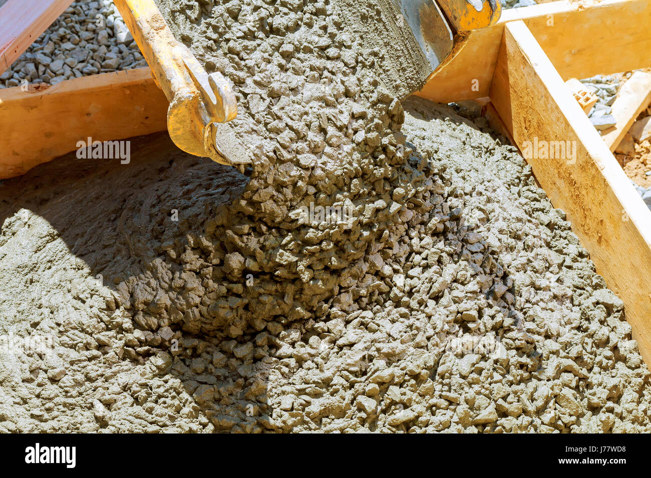 Concreting sidewalk around the house approach to building Stock Photo ...