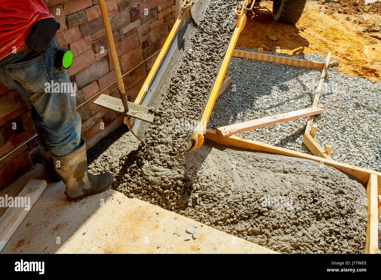 Concrete workers are concreted approach to building Stock Photo - Alamy