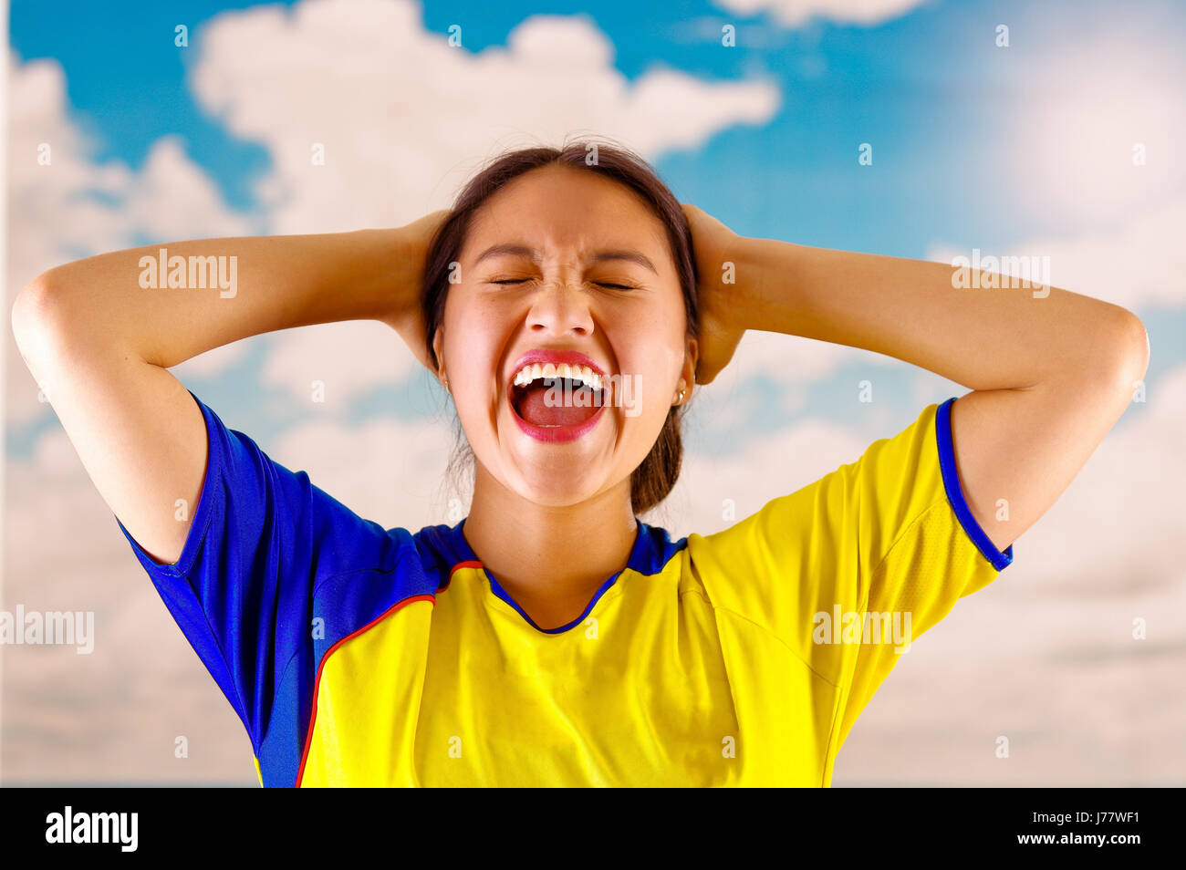 Young ecuadorian woman wearing official Marathon football shirt ...