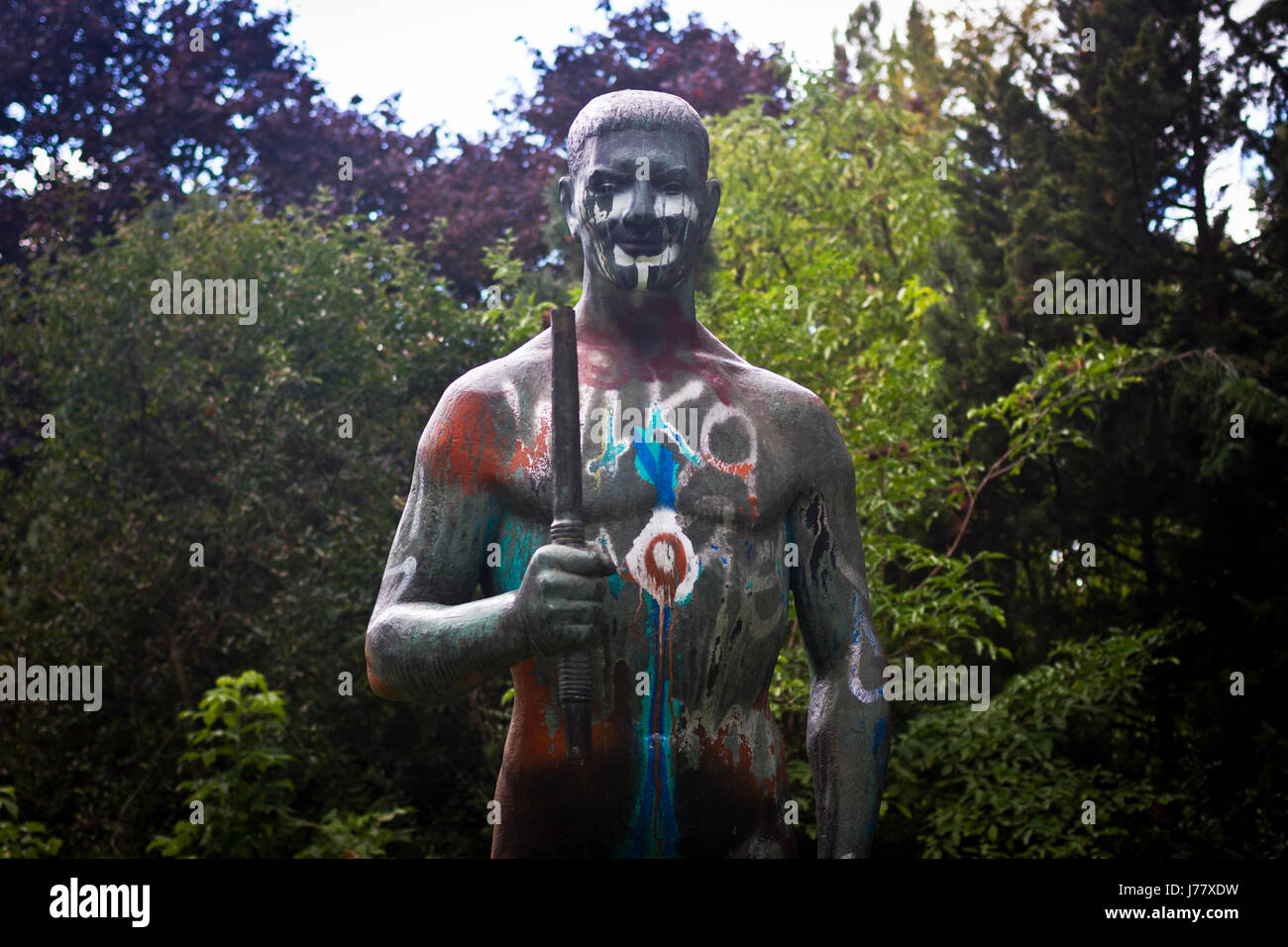 A graffitied statue in a park in Berlin, Germany Stock Photo - Alamy