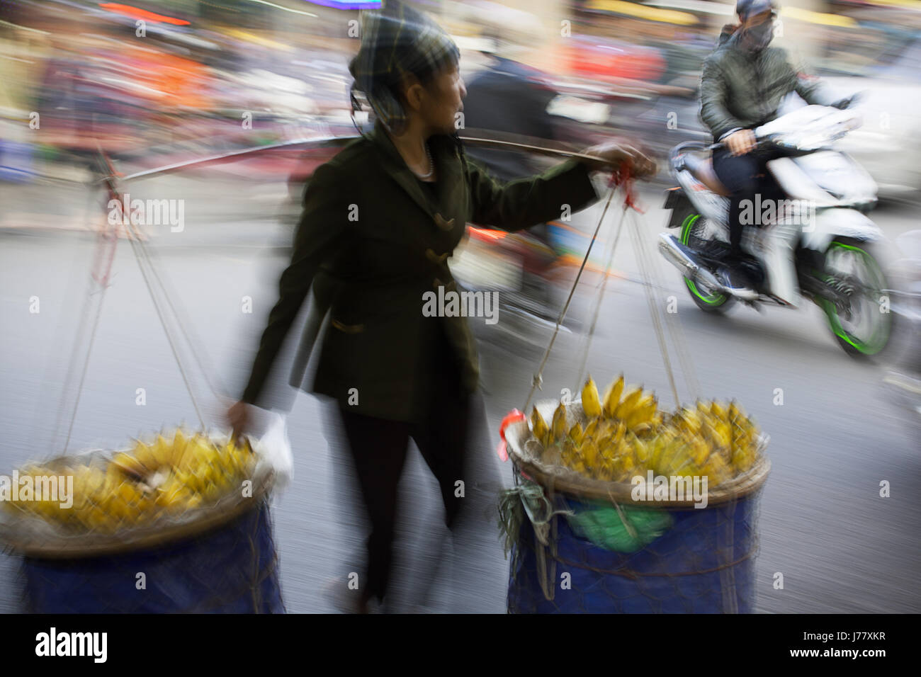 Bamboo carrying pole hi-res stock photography and images - Alamy