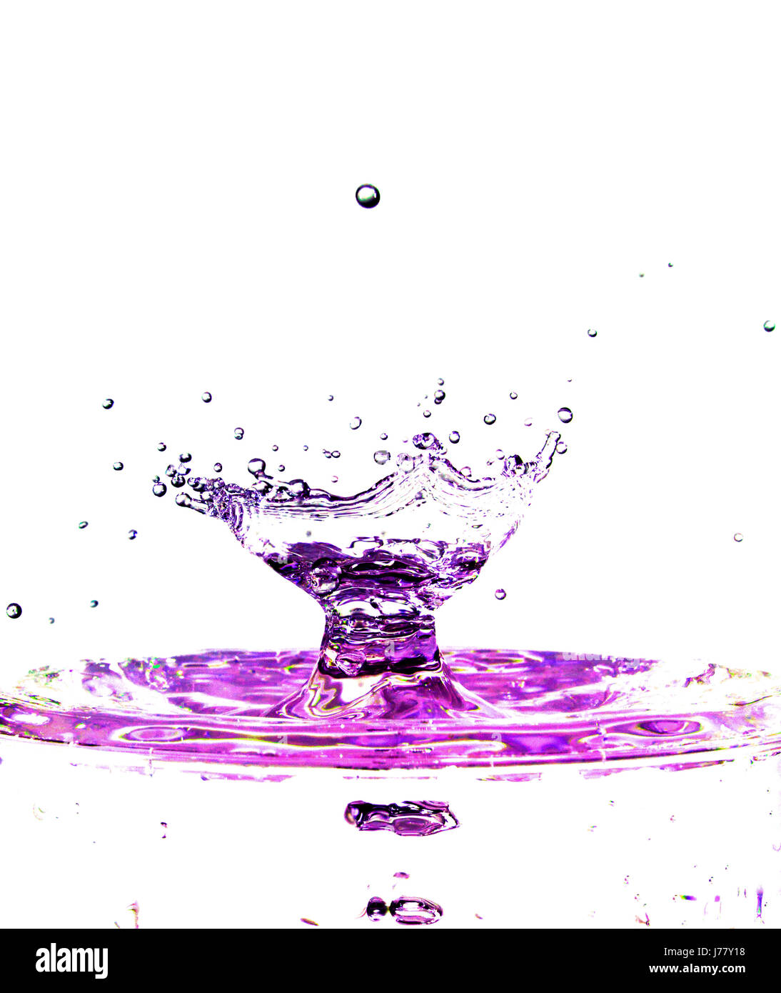Colorful liquid splash isolated on white background closeup Stock Photo ...