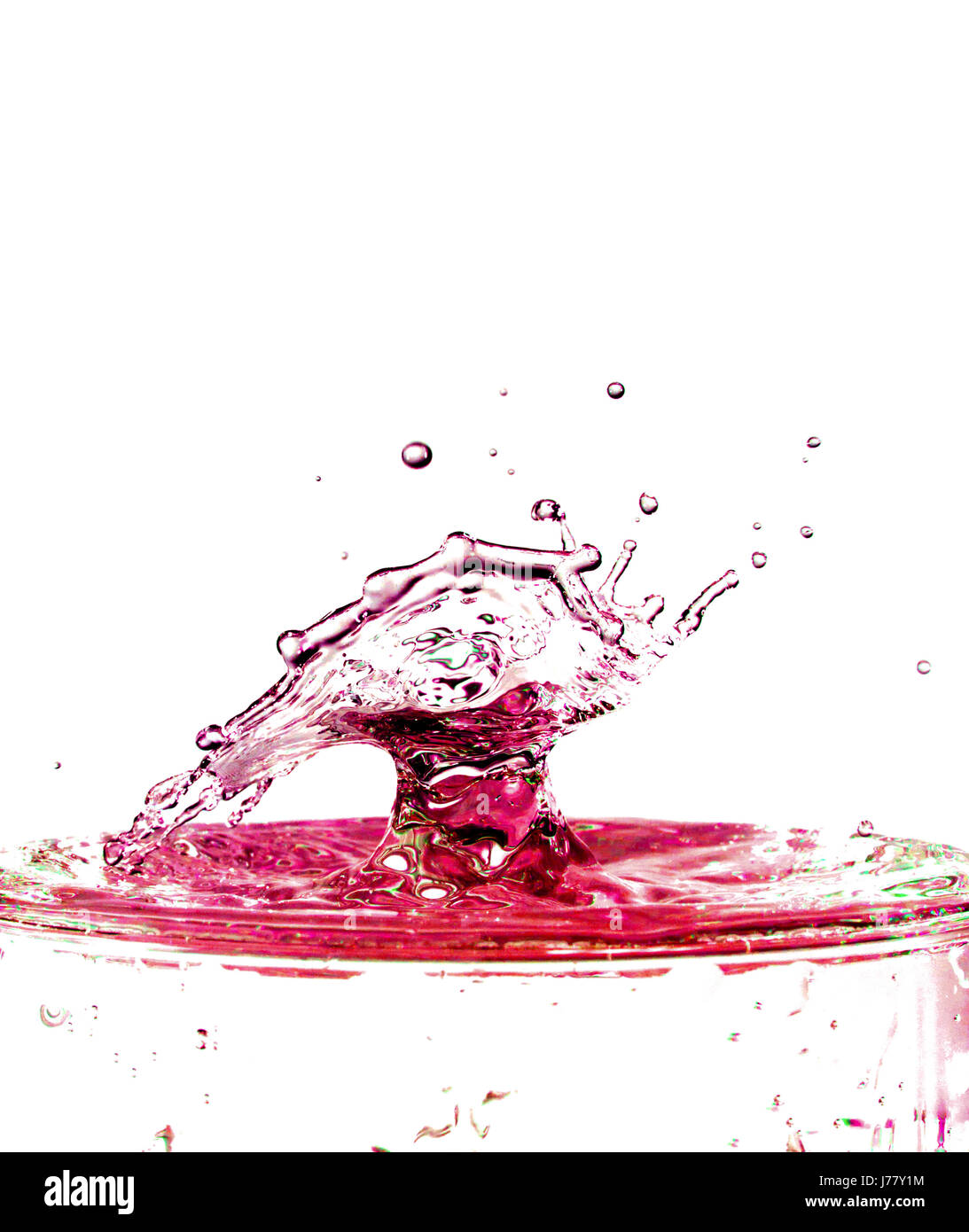 Colorful liquid splash isolated on white background closeup Stock Photo ...