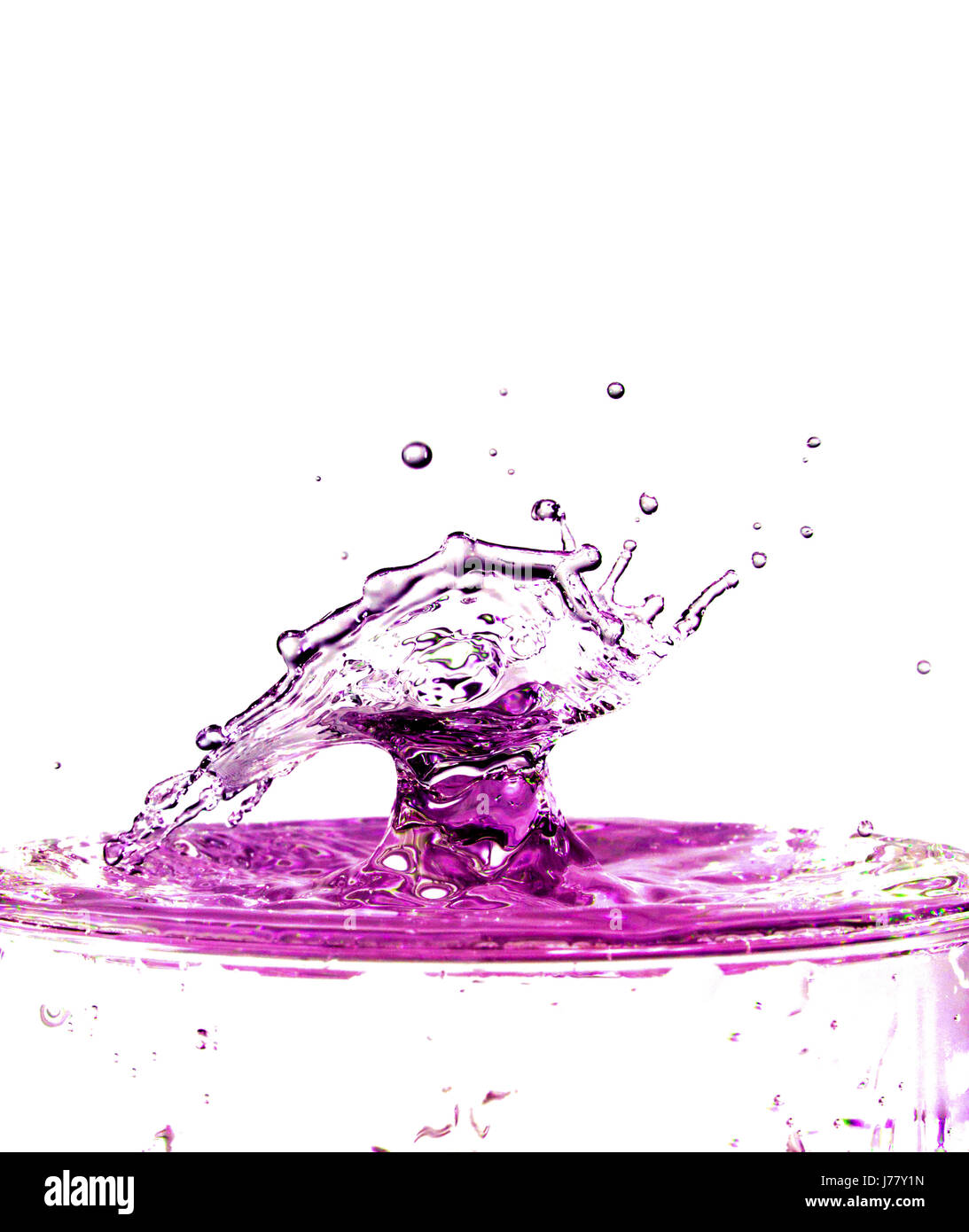 Colorful liquid splash isolated on white background closeup Stock Photo ...