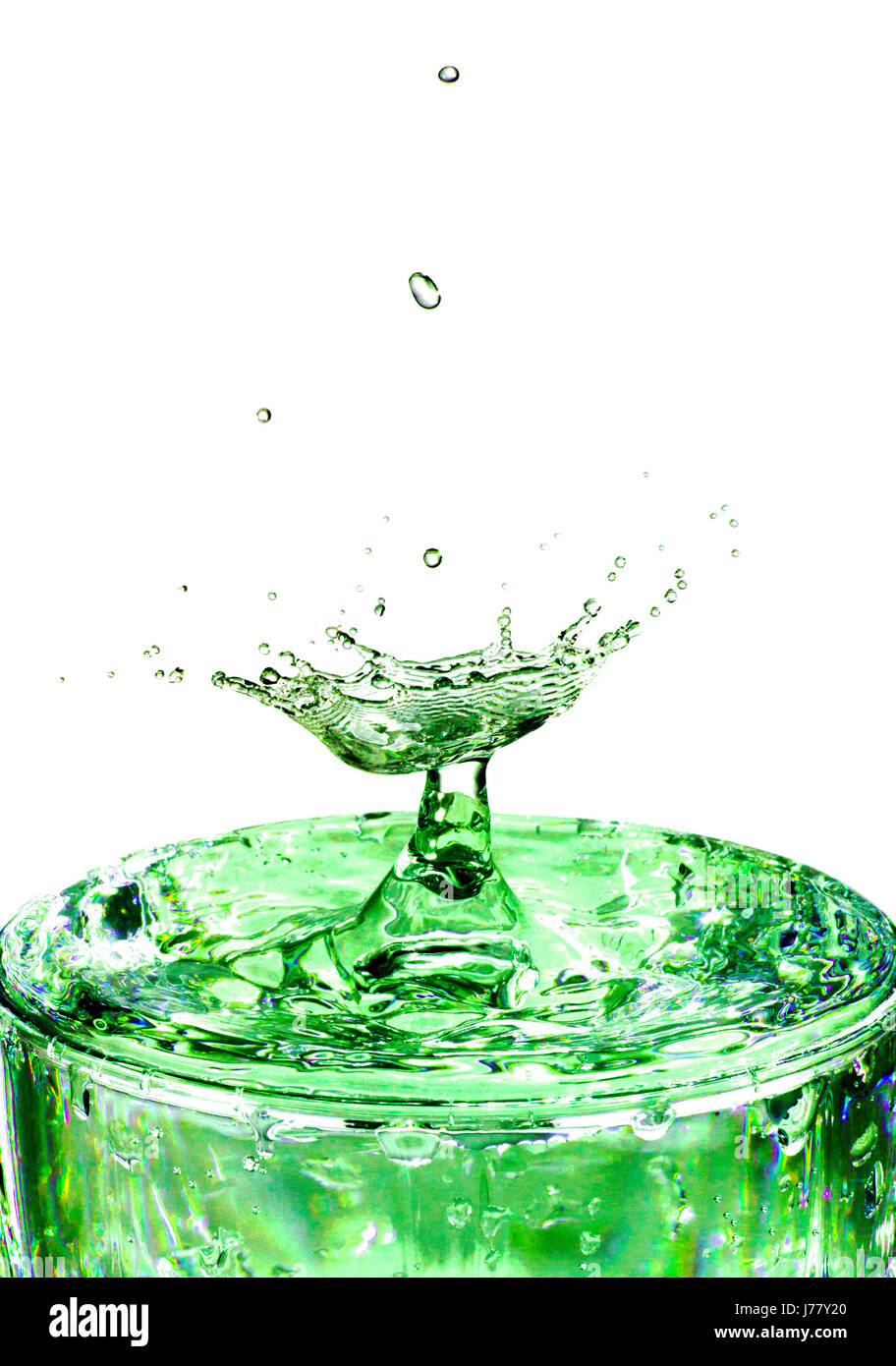 Colorful liquid splash isolated on white background closeup Stock Photo ...