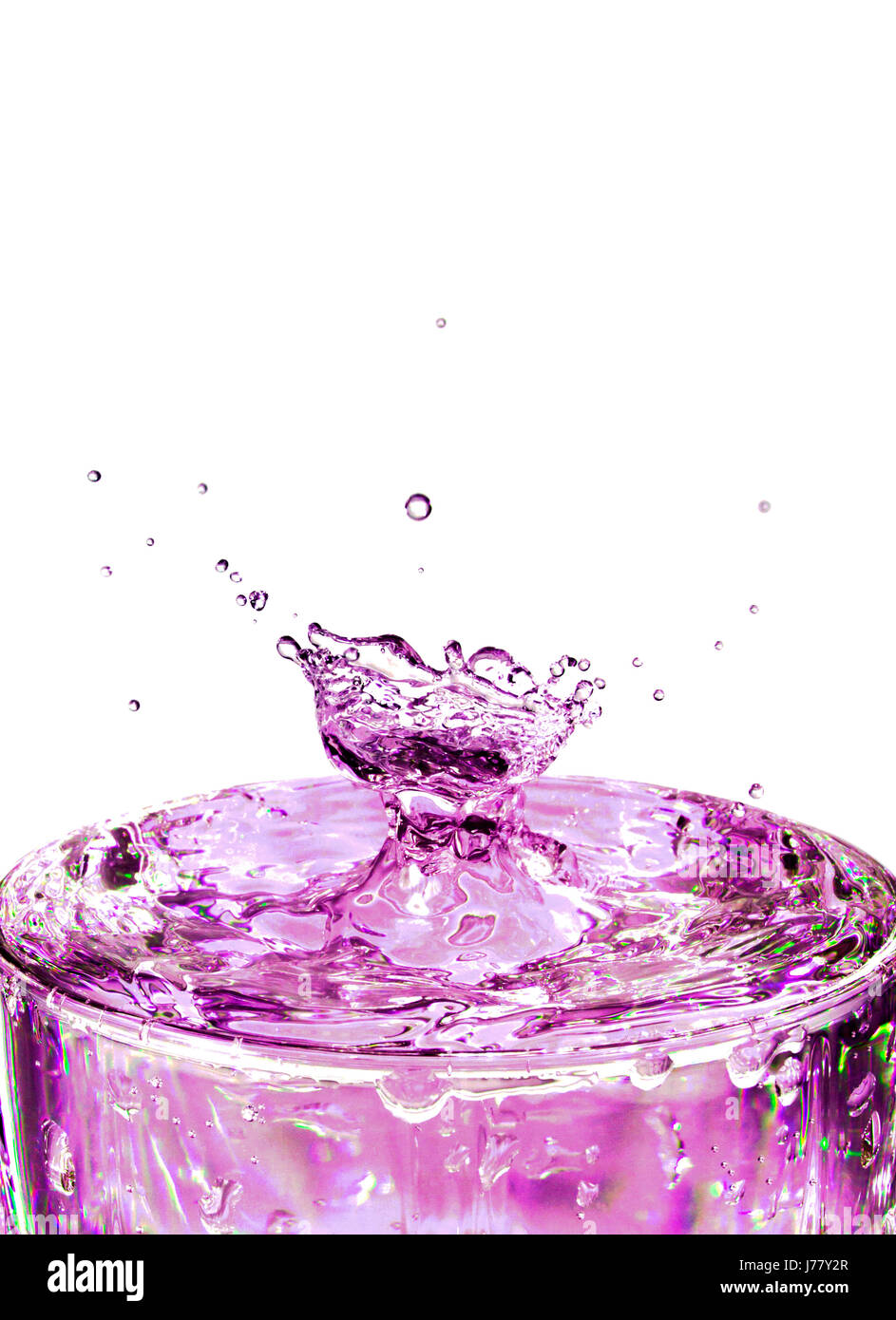 Colorful liquid splash isolated on white background closeup Stock Photo ...
