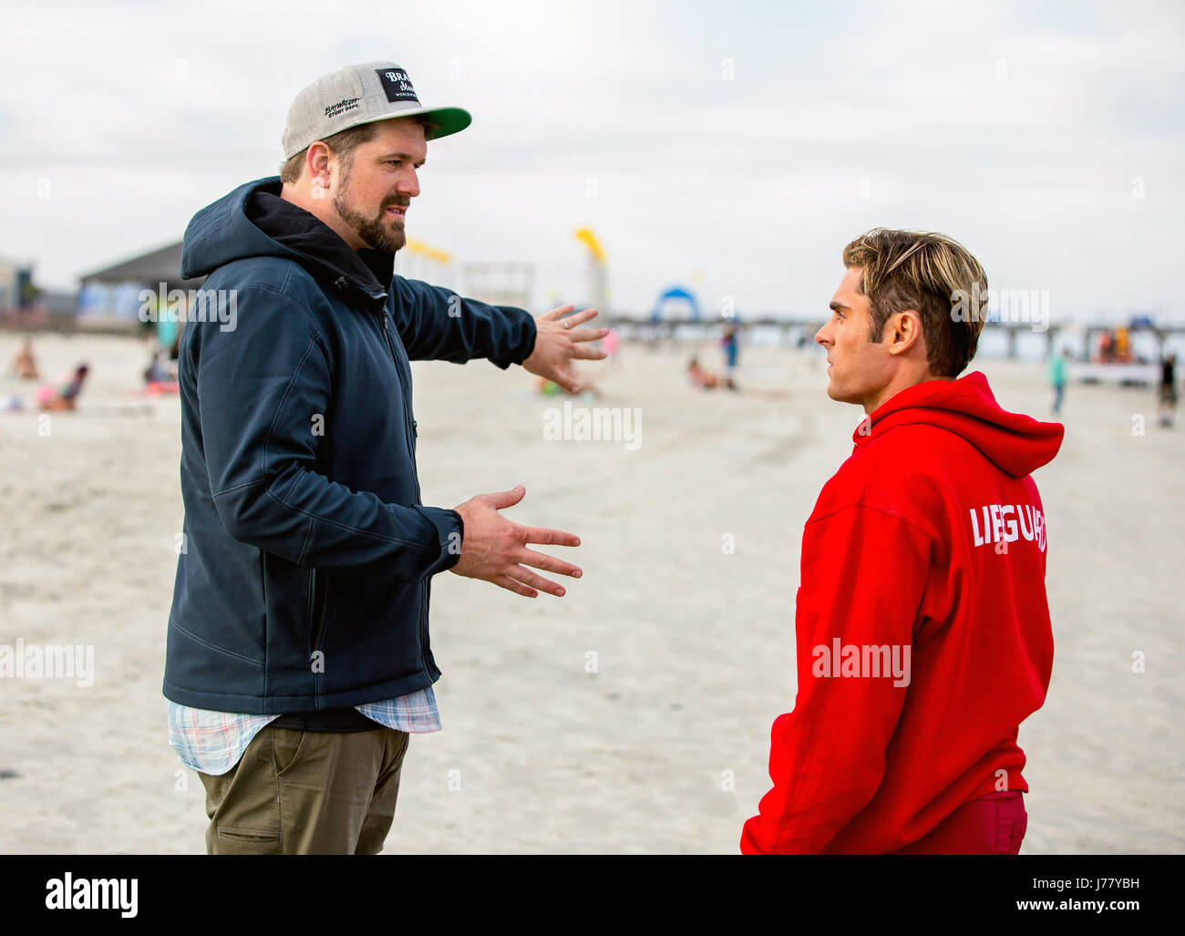 BAYWATCH, l-r: director Seth Gordon, Zac Efron on set, 2017. ph: Frank ...