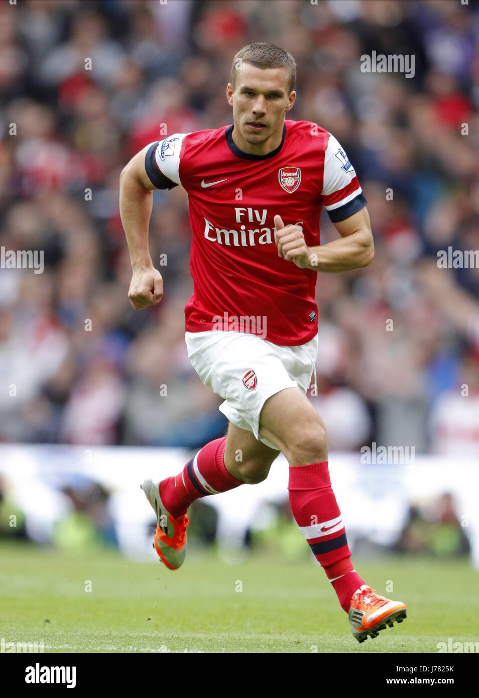 LUKAS PODOLSKI ARSENAL FC ETIHAD STADIUM MANCHESTER ENGLAND 23 ...