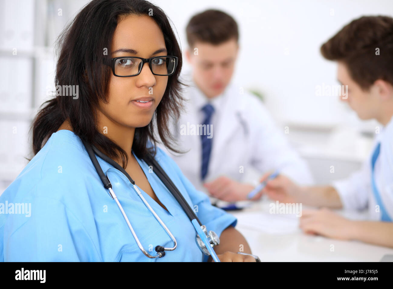 Team doctors sitting laboratory hi-res stock photography and images - Alamy