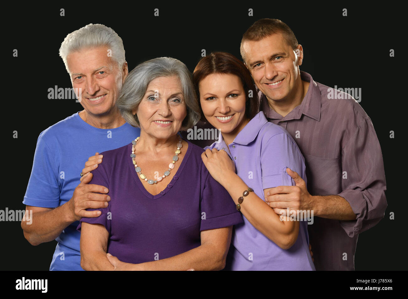 Portrait of happy parents with grown-up children Stock Photo - Alamy