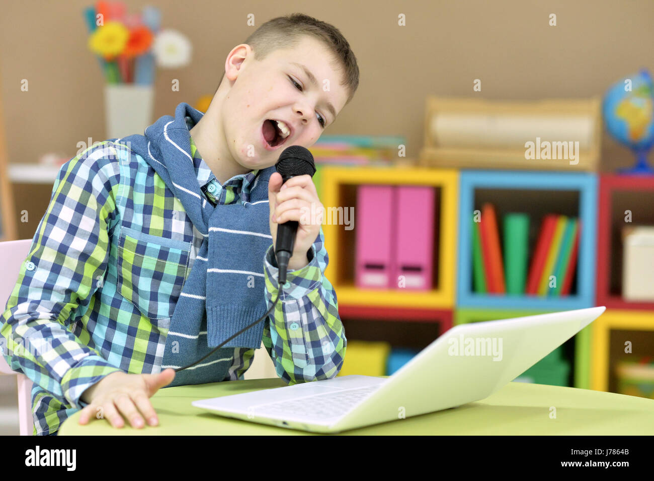 Teen boy microphone school hi-res stock photography and images - Alamy
