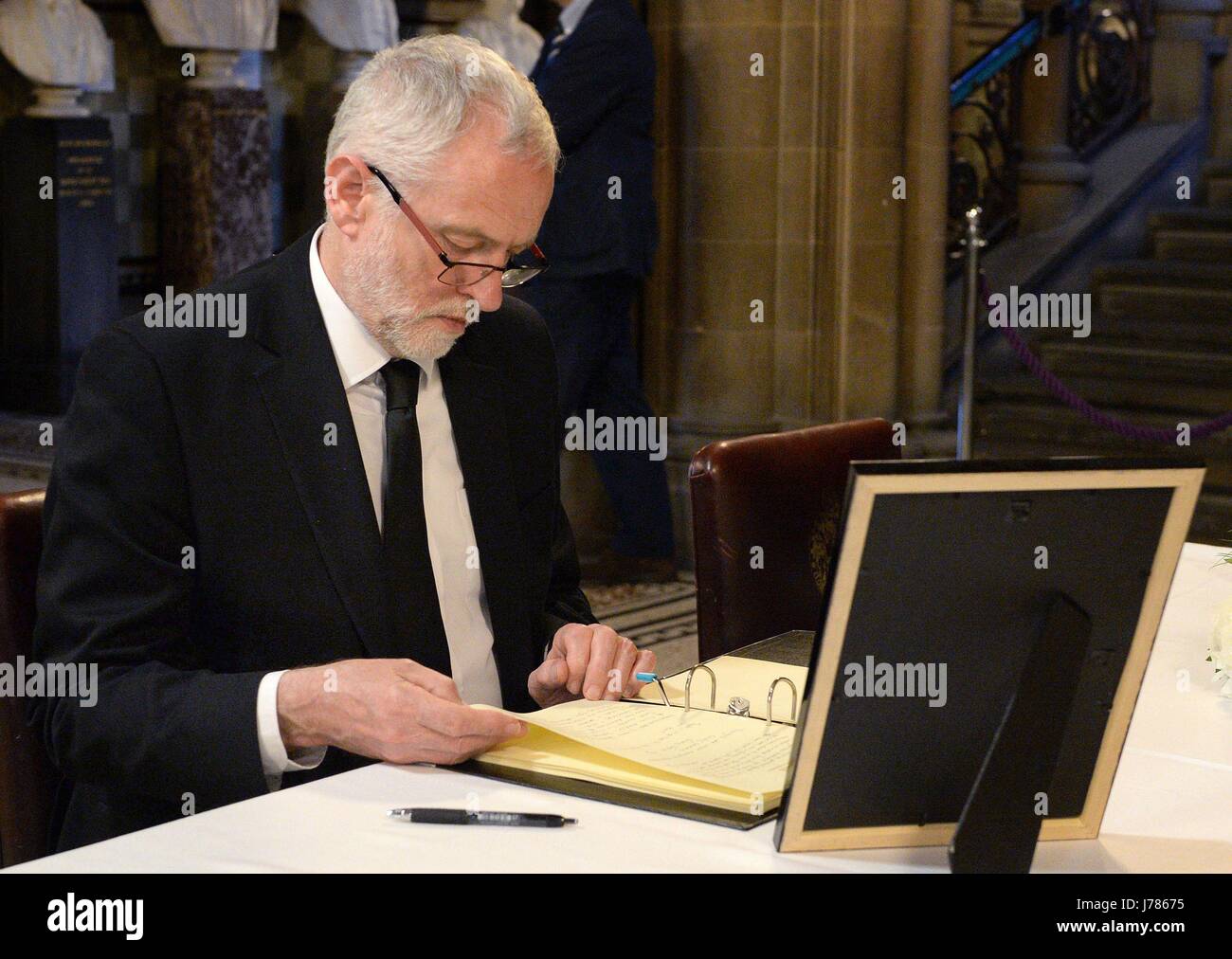 Labour leader Jeremy Corbyn signs a book of condolence at Manchester ...