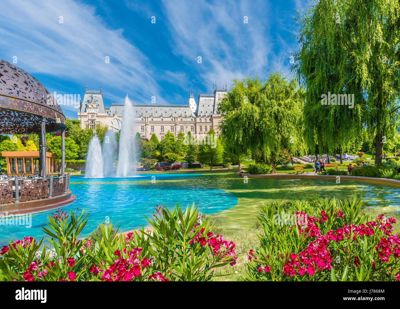 Water fountain in central square in Iasi town, Cultural Palace in ...