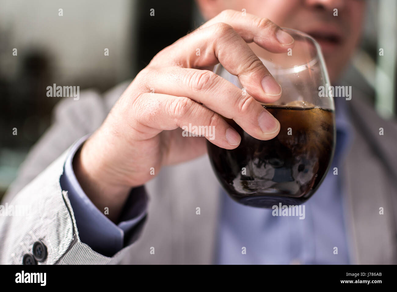 Hand holding coca cola bottle hi-res stock photography and images - Alamy