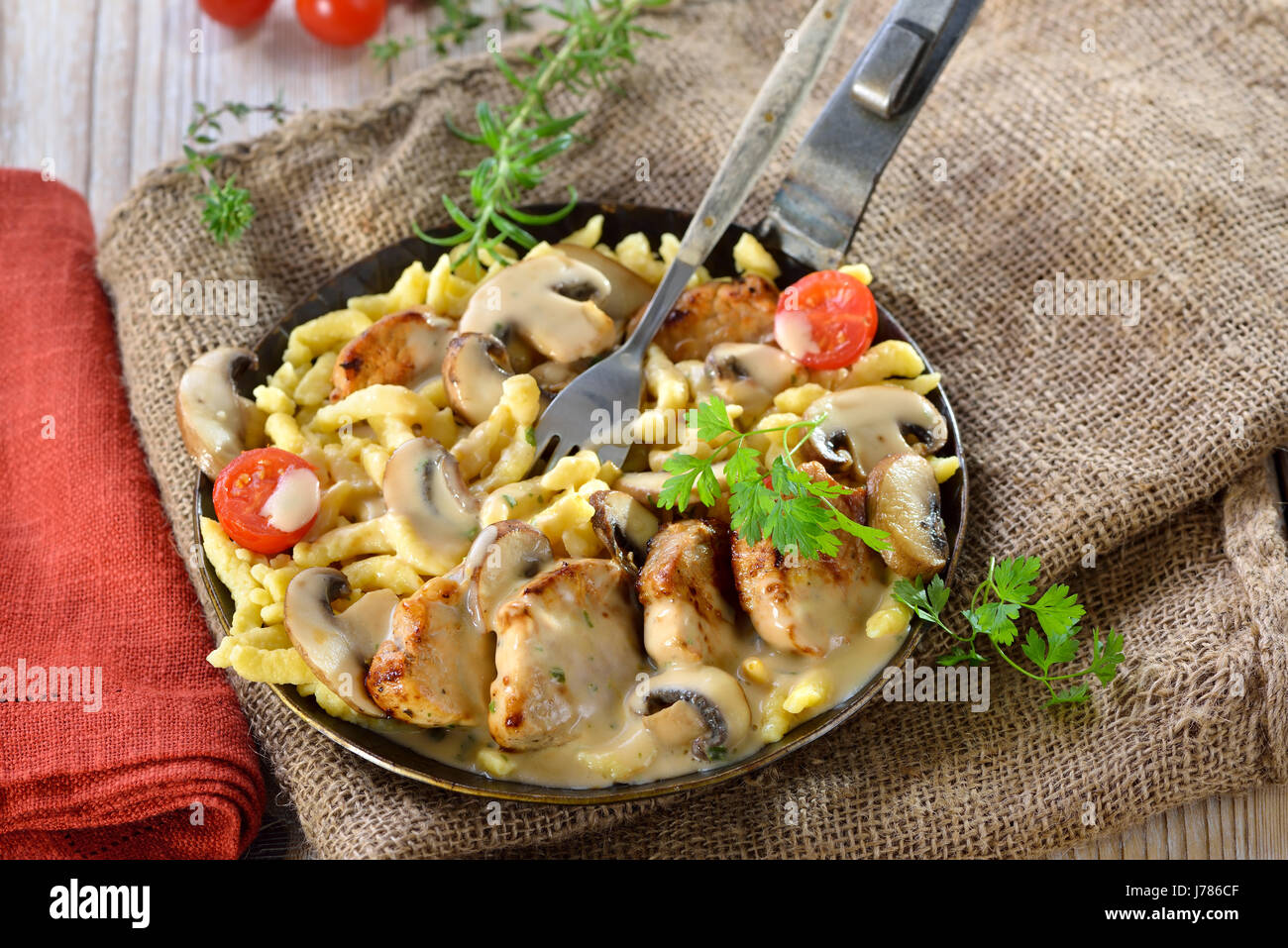 Fried medallions of pork fillet with Swabian spaetzle (so called ...
