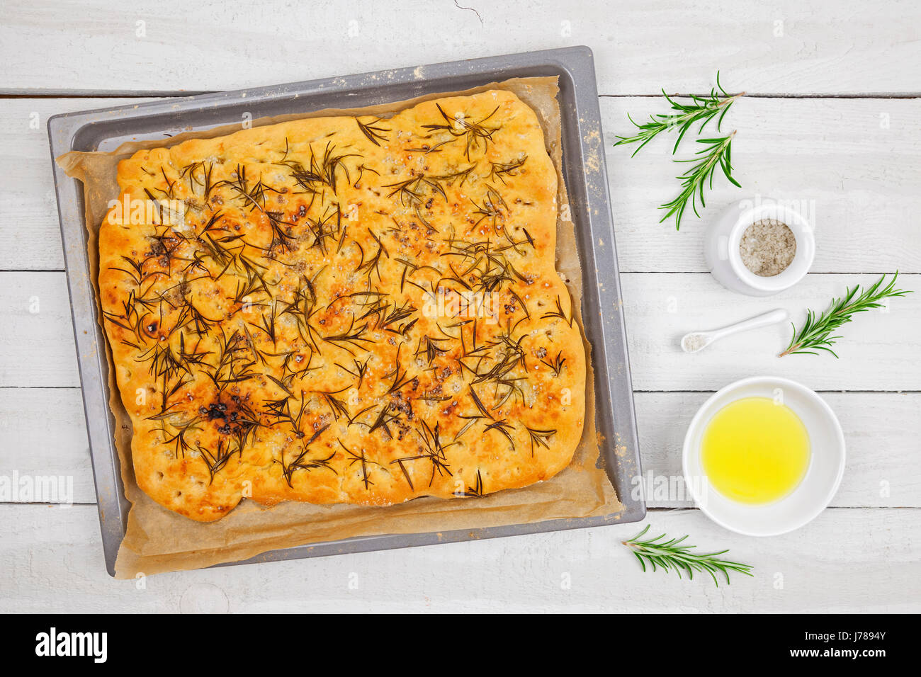 Focaccia on baking tray Stock Photo - Alamy