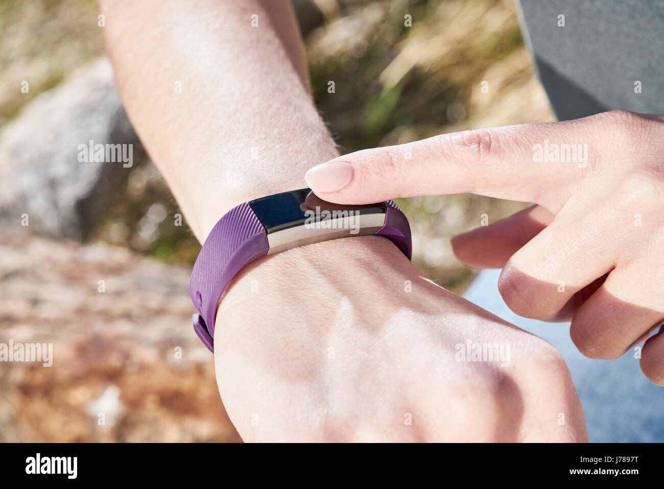 Using activity tracker Stock Photo - Alamy