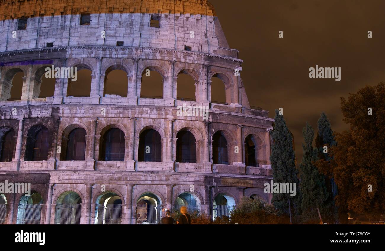 colour night nighttime illuminated landmark color colosseum italy blue ...