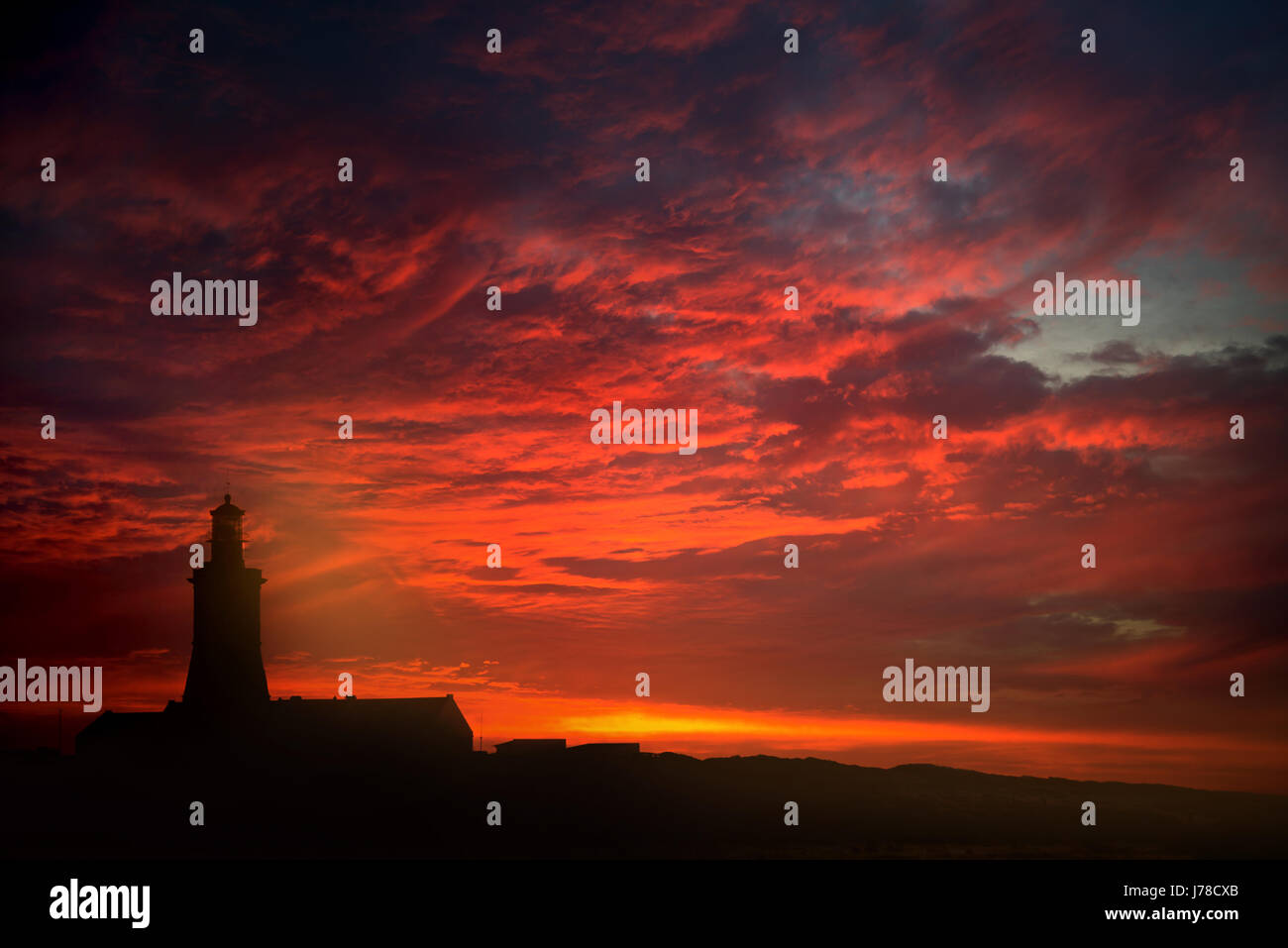 Beautiful Cabo Espichel lighthouse in Portugal, by sunset Stock Photo - Alamy