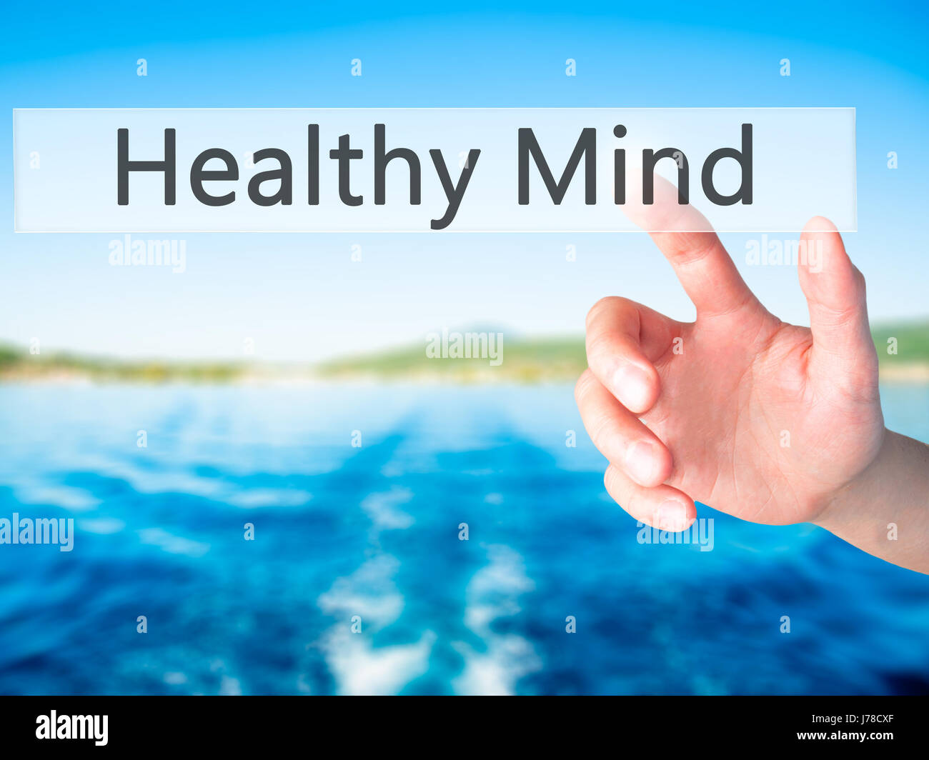 Healthy Mind - Hand pressing a button on blurred background concept ...