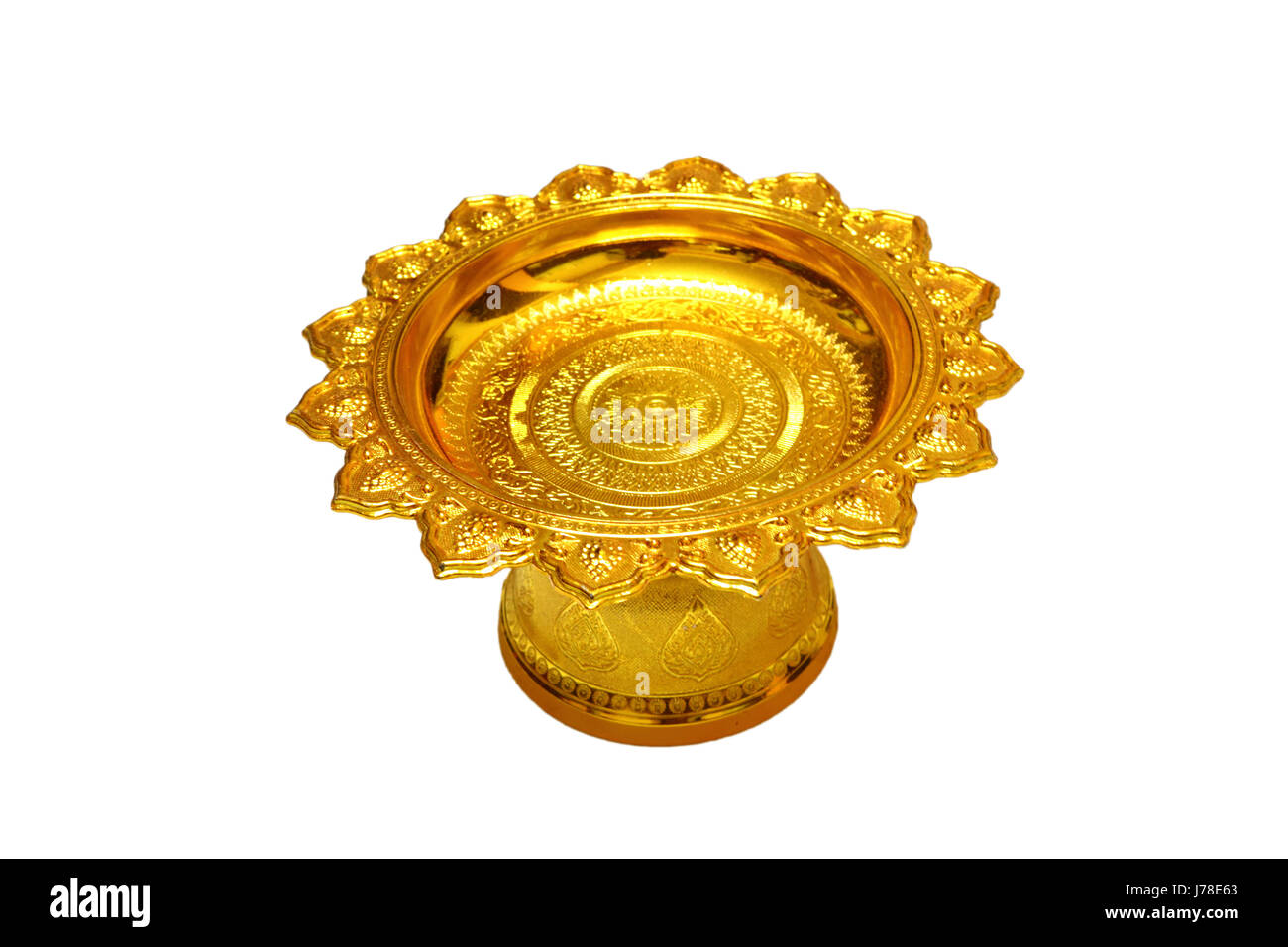 golden pan use in thai ceremony isolation background Stock Photo - Alamy