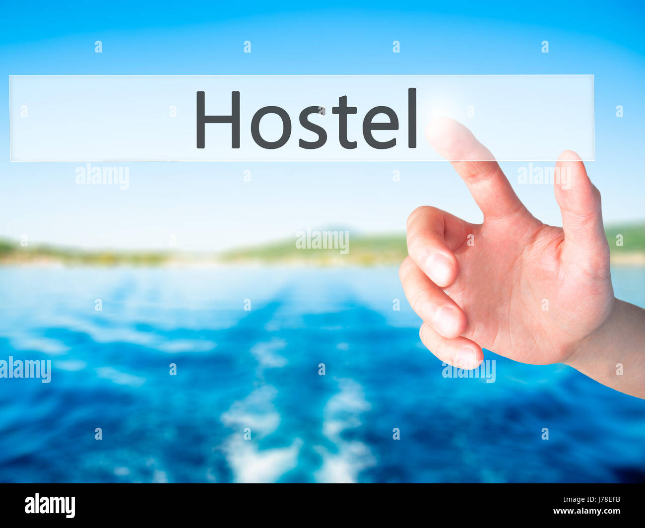 Hostel - Hand pressing a button on blurred background concept ...