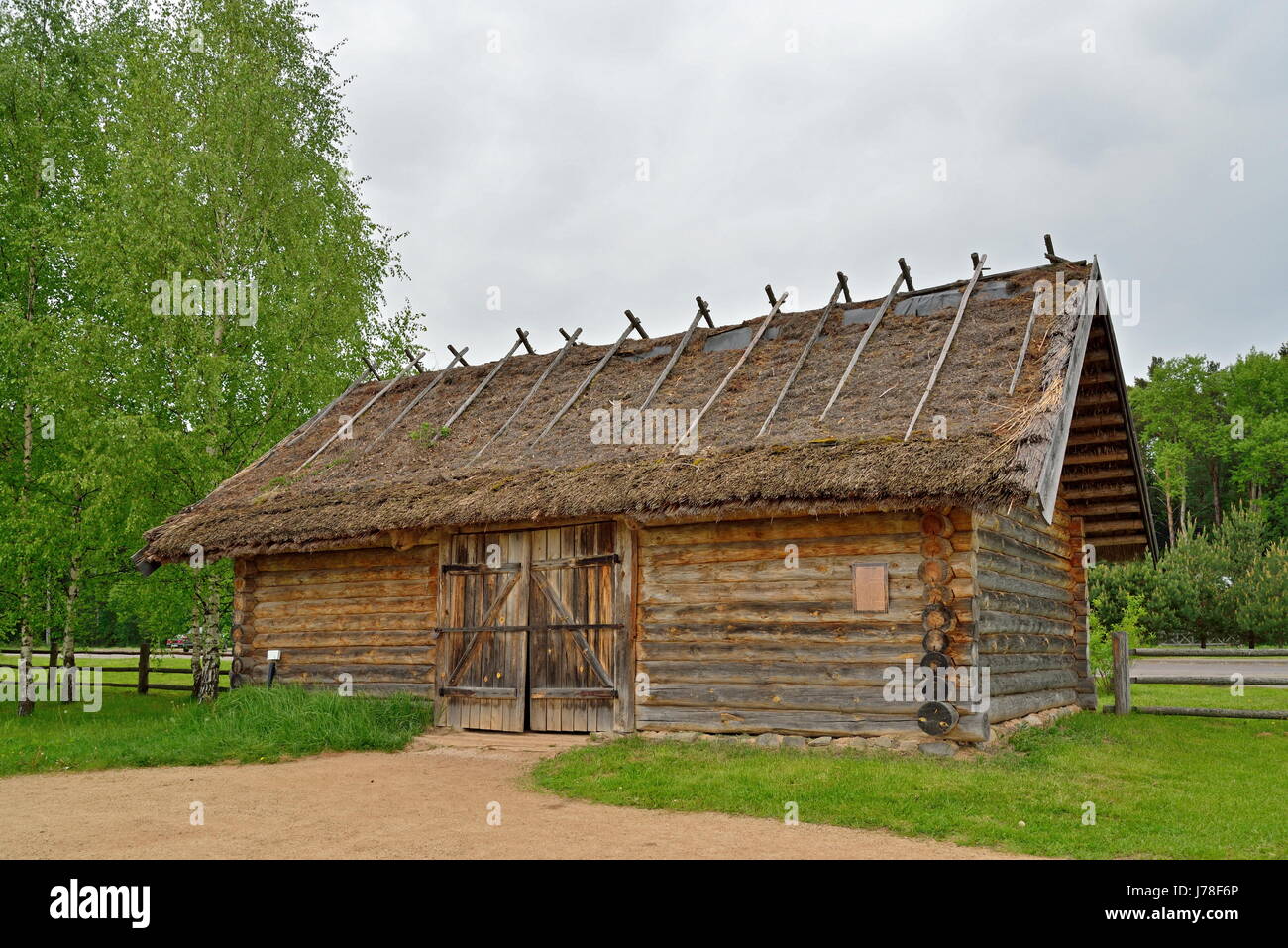 Old Russian log hut in Pushkin Mikhailovskoe summer cloudy day Stock ...
