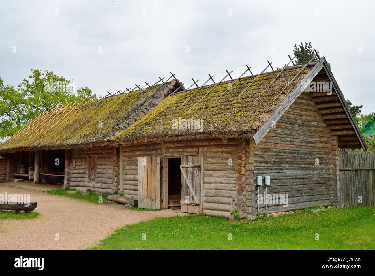 Old Russian log hut in Pushkin Mikhailovskoe summer cloudy day Stock ...