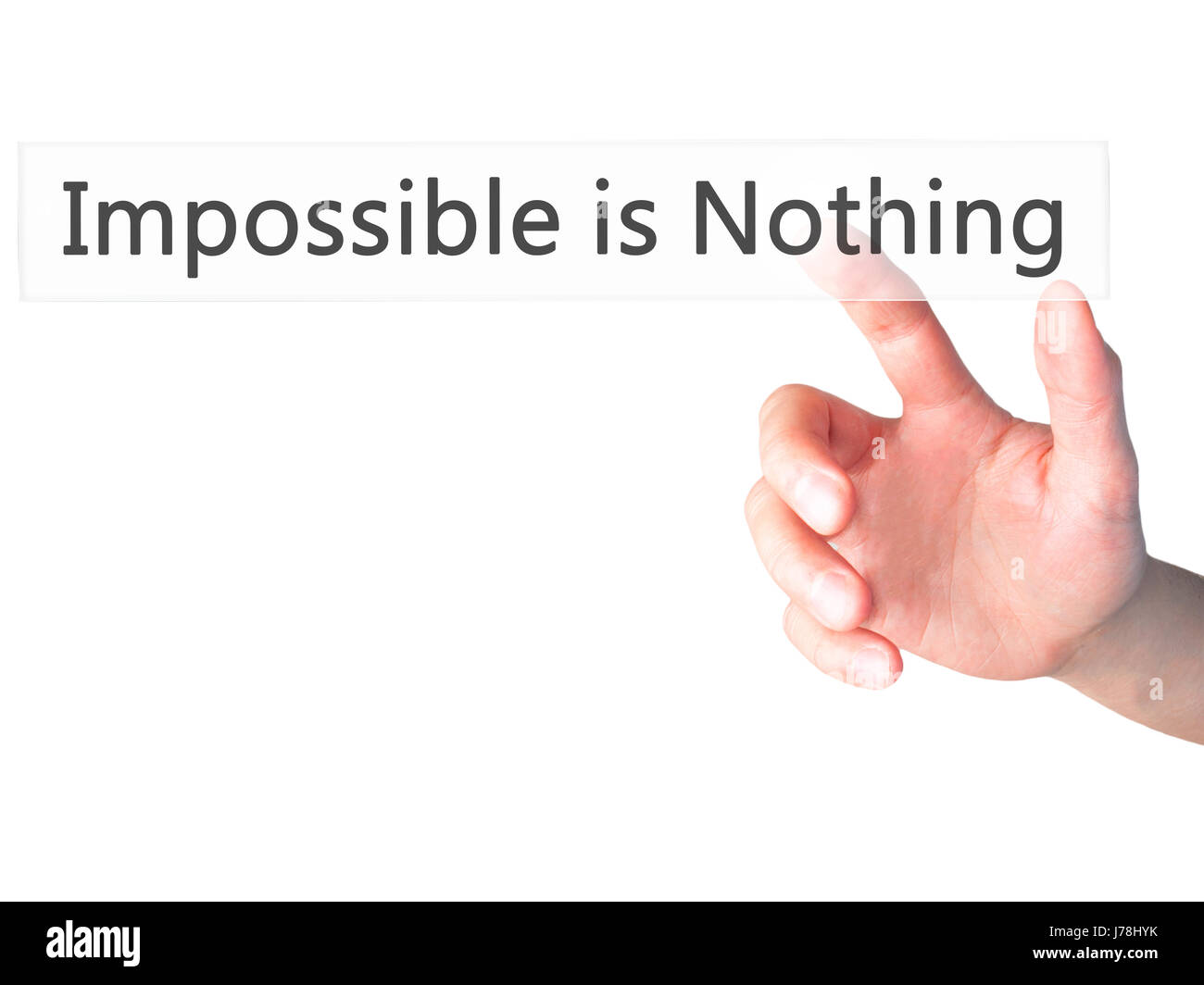 Impossible is Nothing - Hand pressing a button on blurred background ...