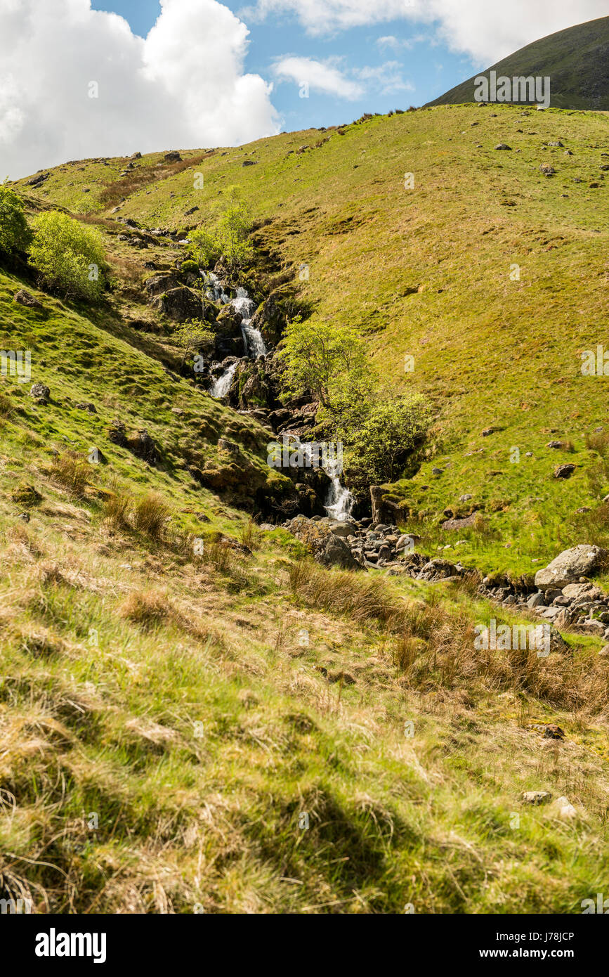 Cumbria Landscape featuring the cascading waters and falls of Red Tarn ...