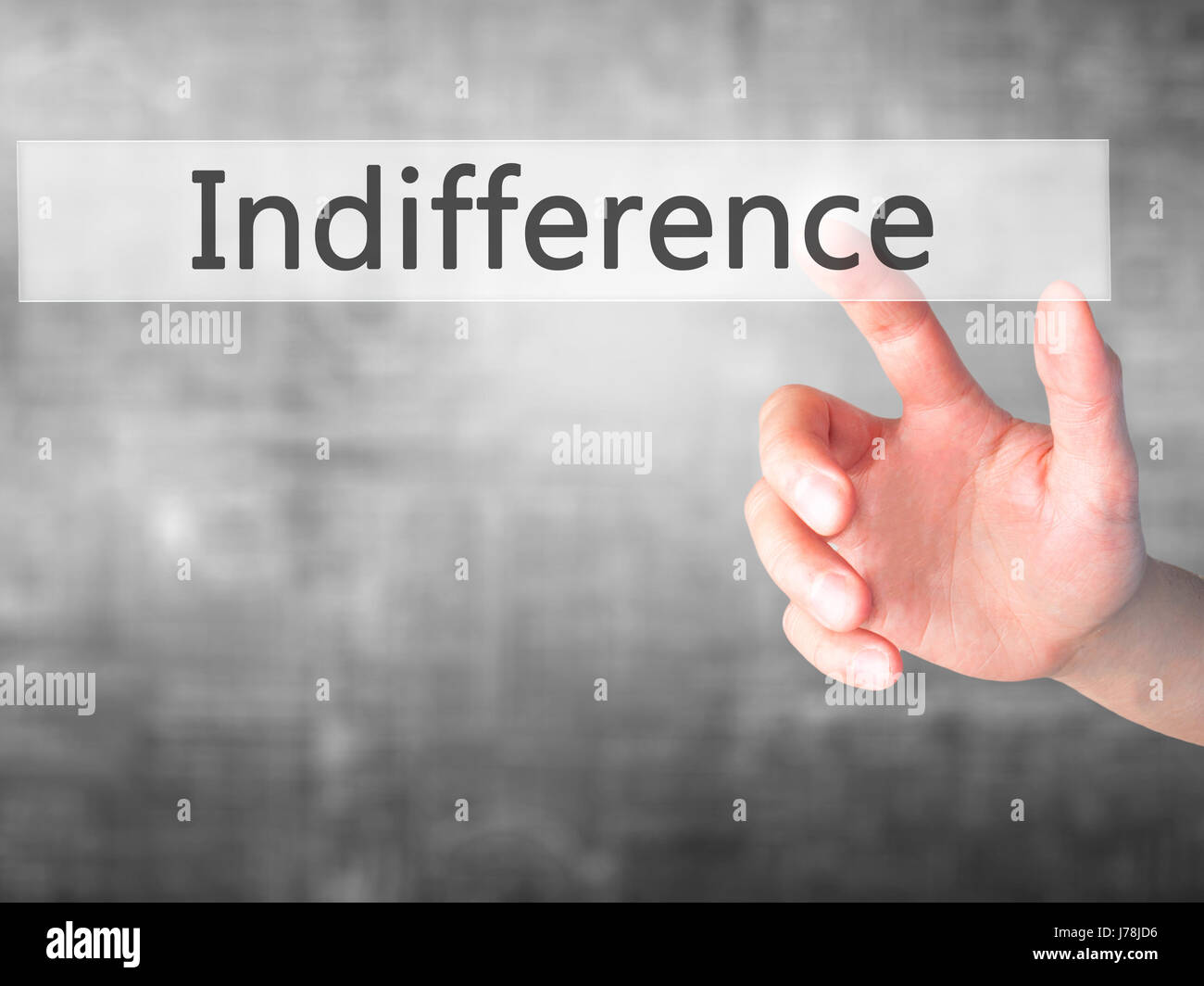 Indifference - Hand pressing a button on blurred background concept ...