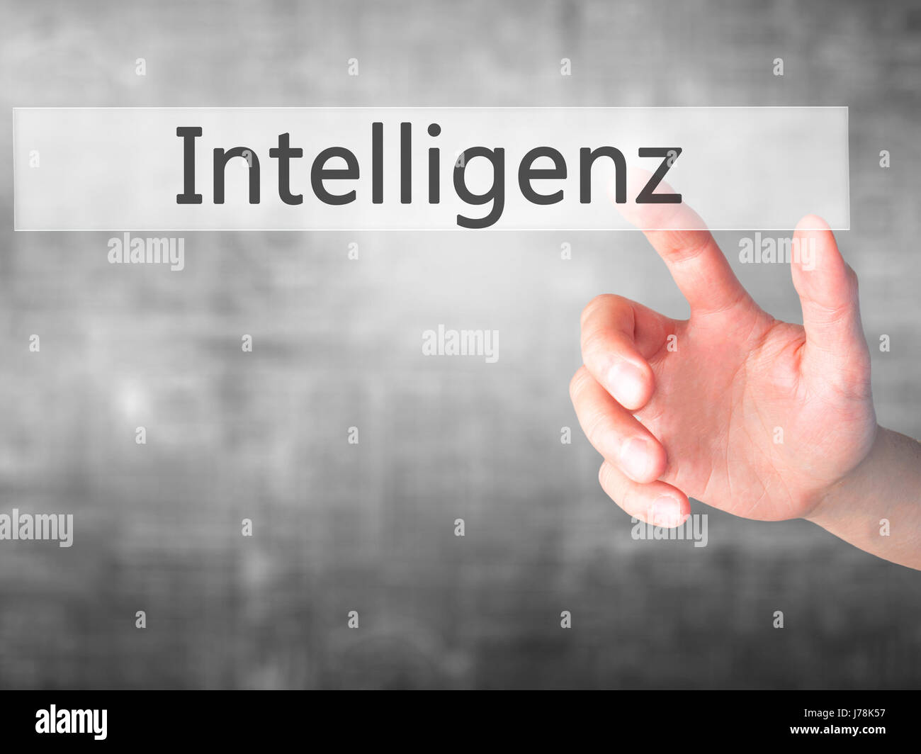 Intelligenz (Intelligence in German) - Hand pressing a button on ...