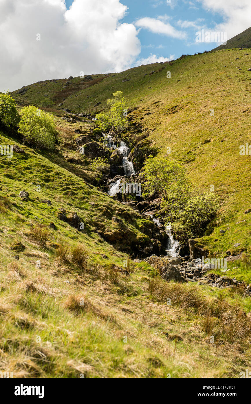Cumbria Landscape featuring the cascading waters and falls of Red Tarn ...