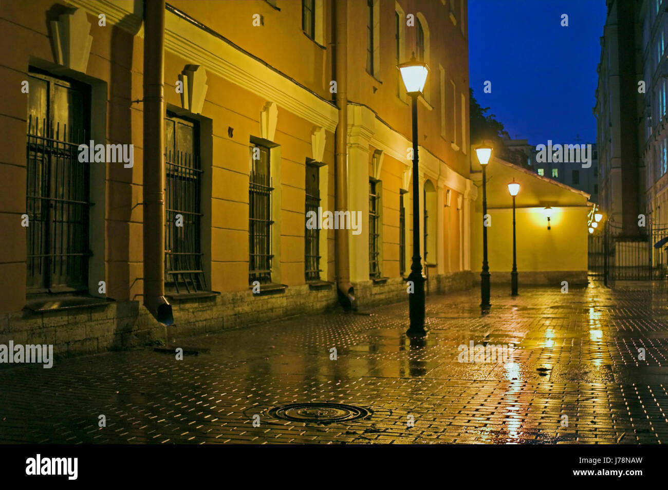 night nighttime evening shiner light lamp luminary sidewalk ...