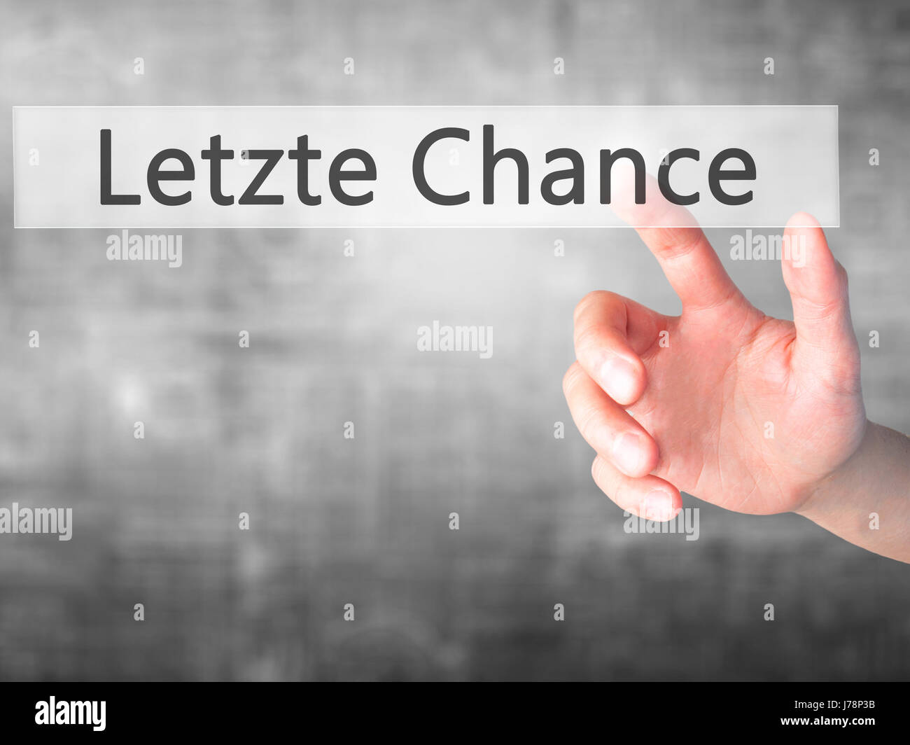 Letzte Chance (Last Chance in German) - Hand pressing a button on ...