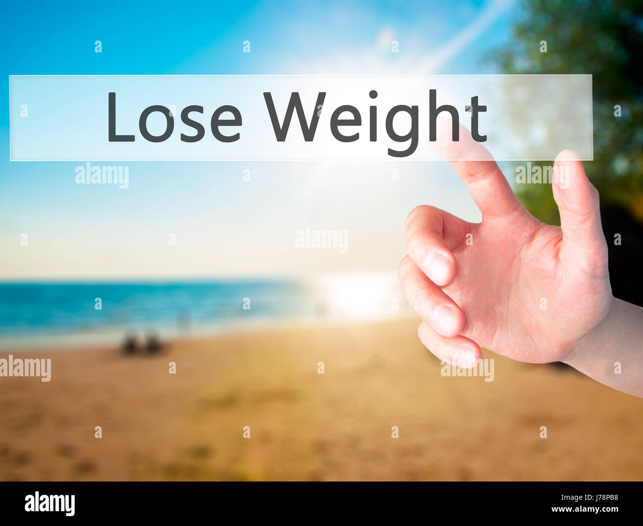 Lose Weight - Hand pressing a button on blurred background concept ...