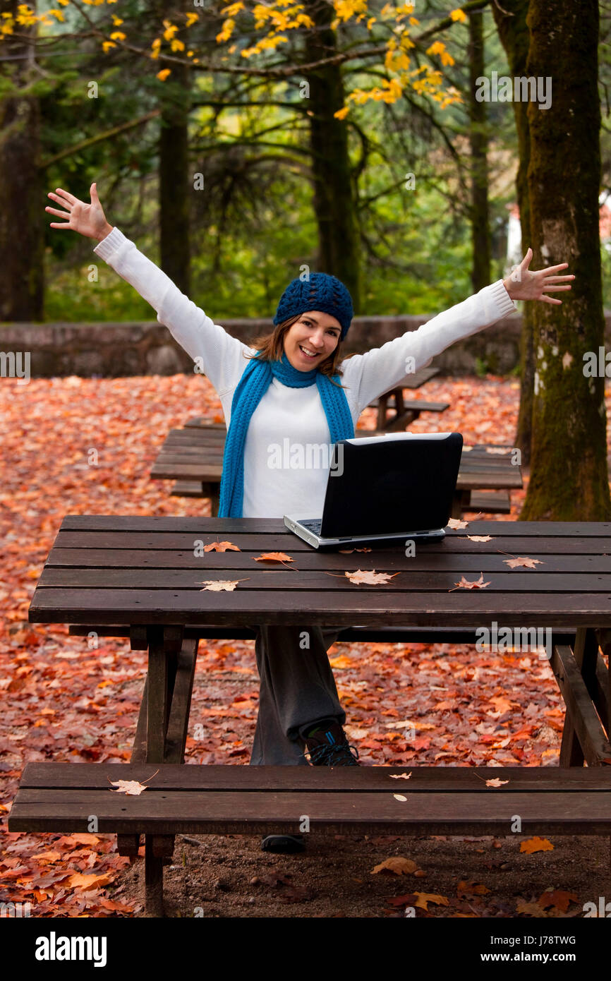 woman laptop notebook computers computer park put sitting sit ...