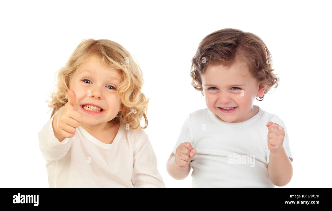 Two happy small children saying Ok and laughing isolated on a white ...
